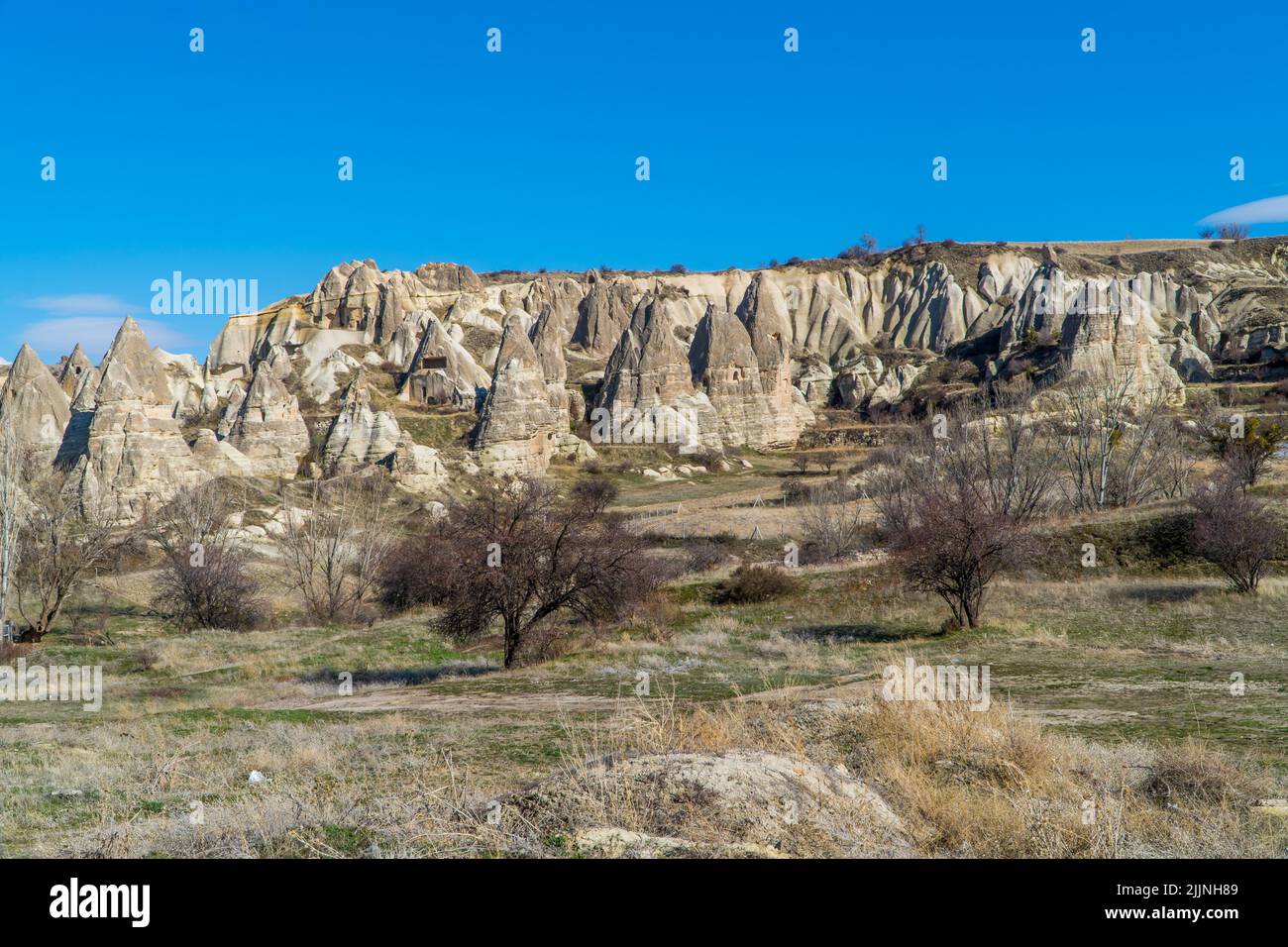 A beautiful view of a landscape with rocks and hills in Cappadocia ...