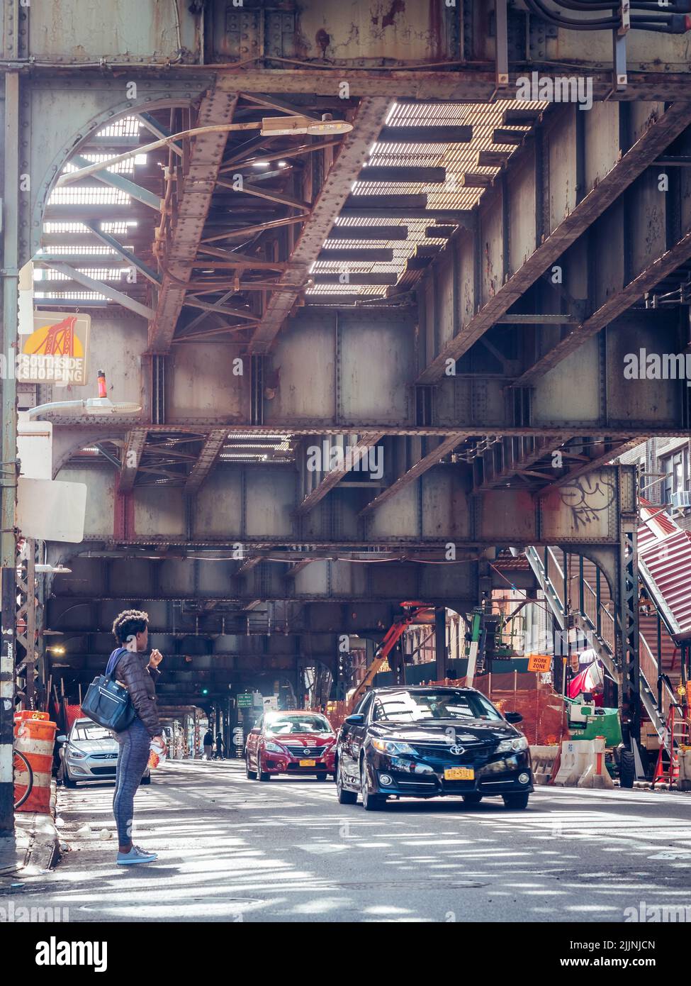 A vertical shot of an underground street in New York City with modern ...