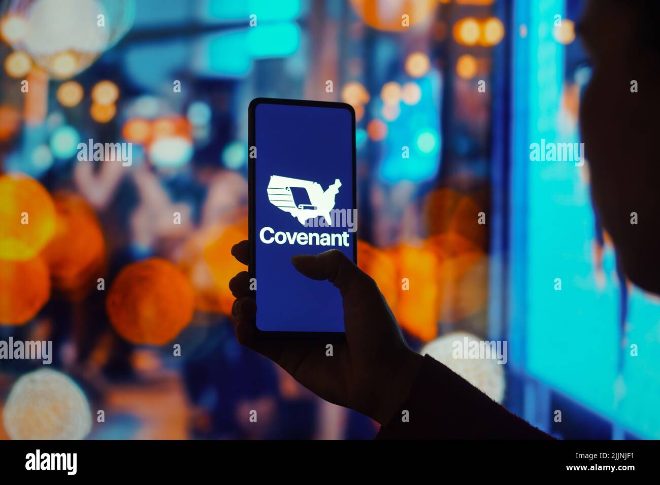 In this photo illustration, the Covenant Logistics Group logo is ...