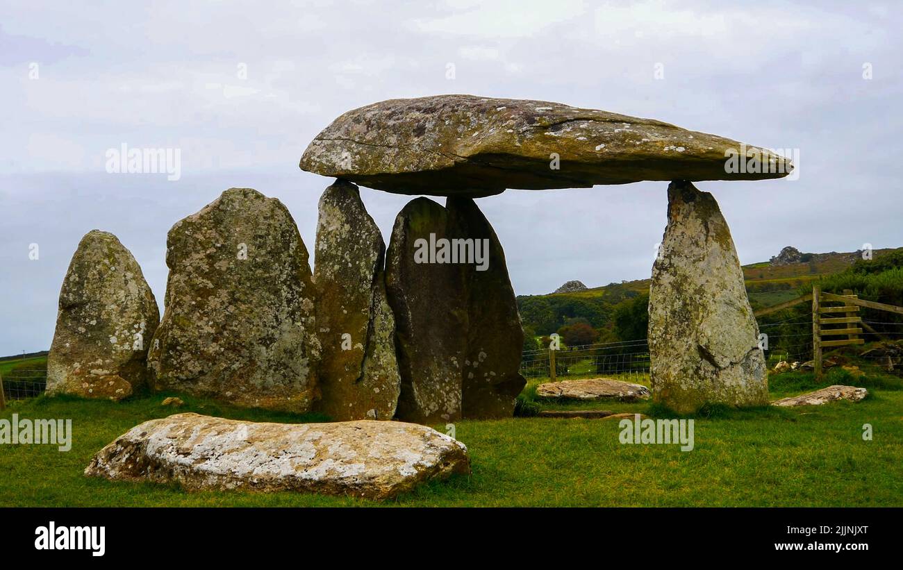 A scenic view of an old structure made from rocks in a rural area on ...