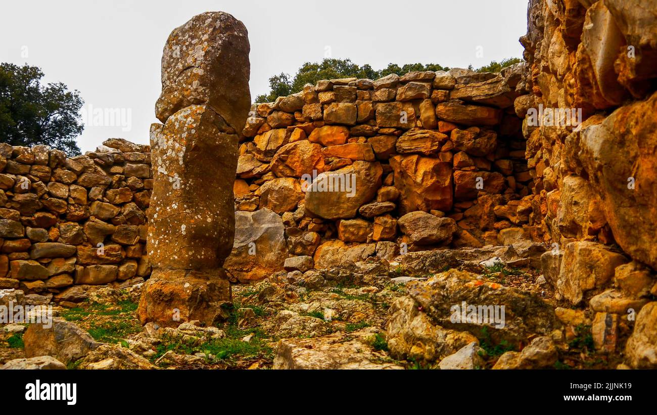 A scenic view of an old structure made from rocks in a rural area Stock ...