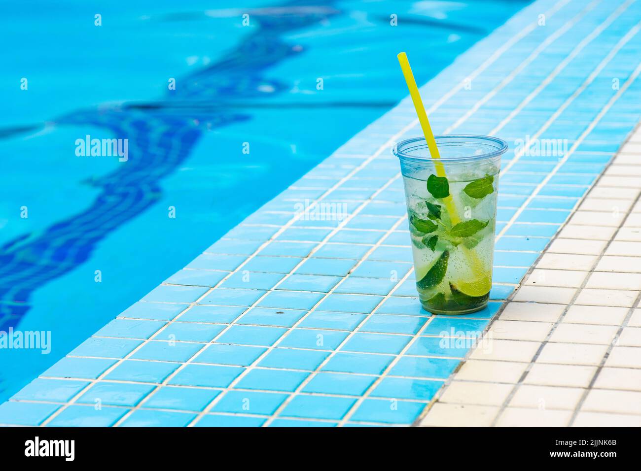 Drinking next to swimming pool hi-res stock photography and images - Alamy