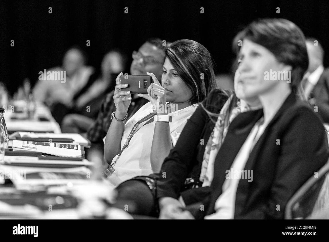 The delegates attending the sales convention at a conference centre ...