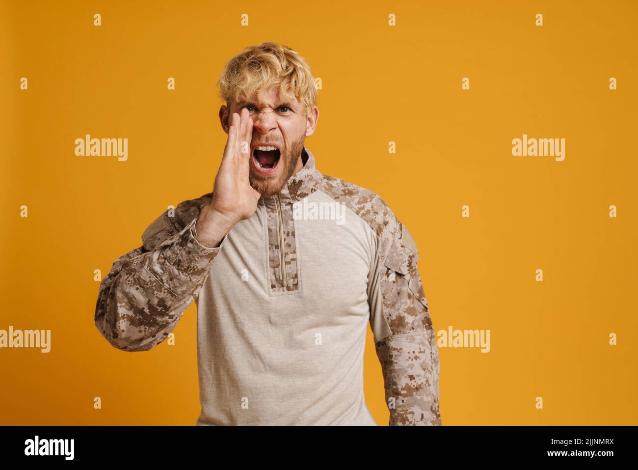 White military man wearing uniform gesturing and screaming isolated ...