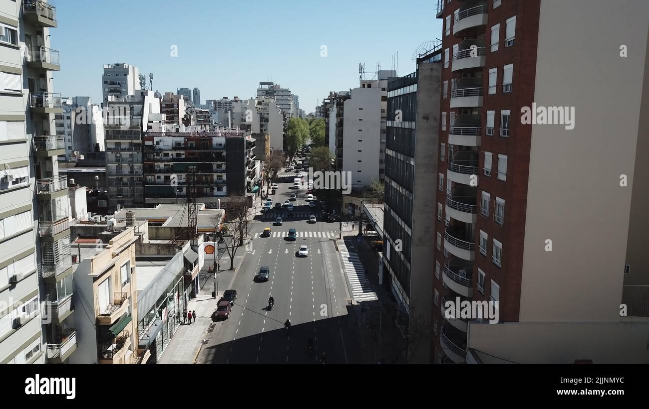 Aerial frontal shot made with a drone of a street in the city of ...
