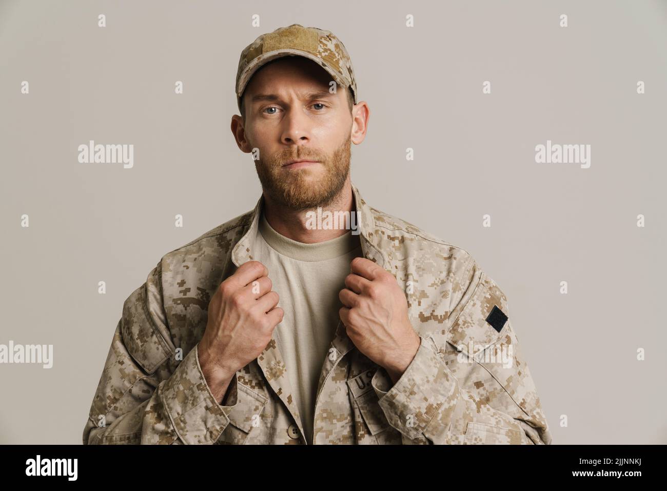 White military man wearing uniform posing and looking at camera ...