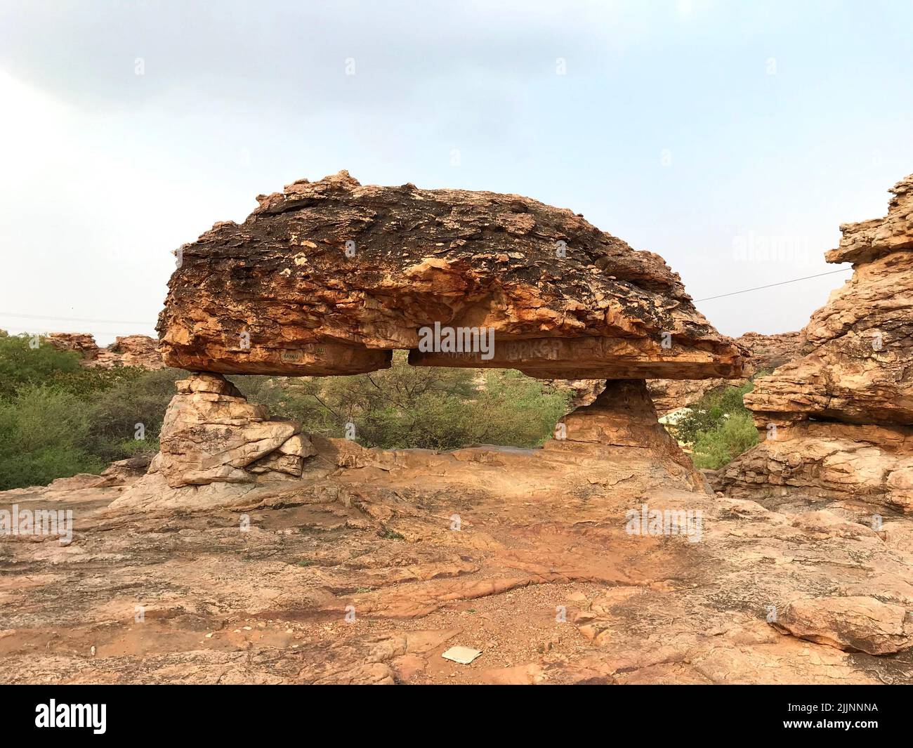 A view of the big rock on the two small stones in the dry area Stock ...