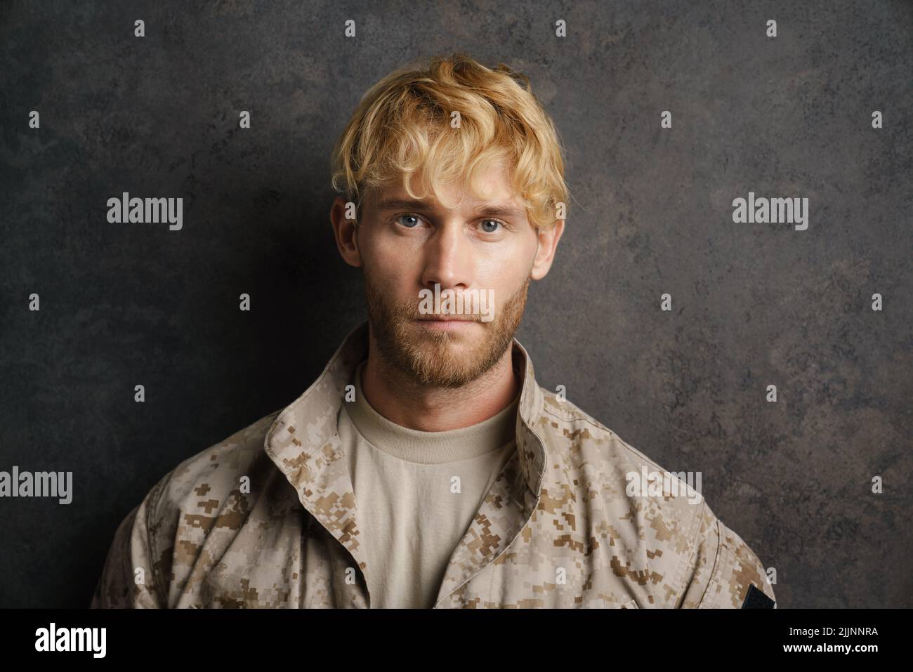 White military man wearing uniform posing and looking at camera ...