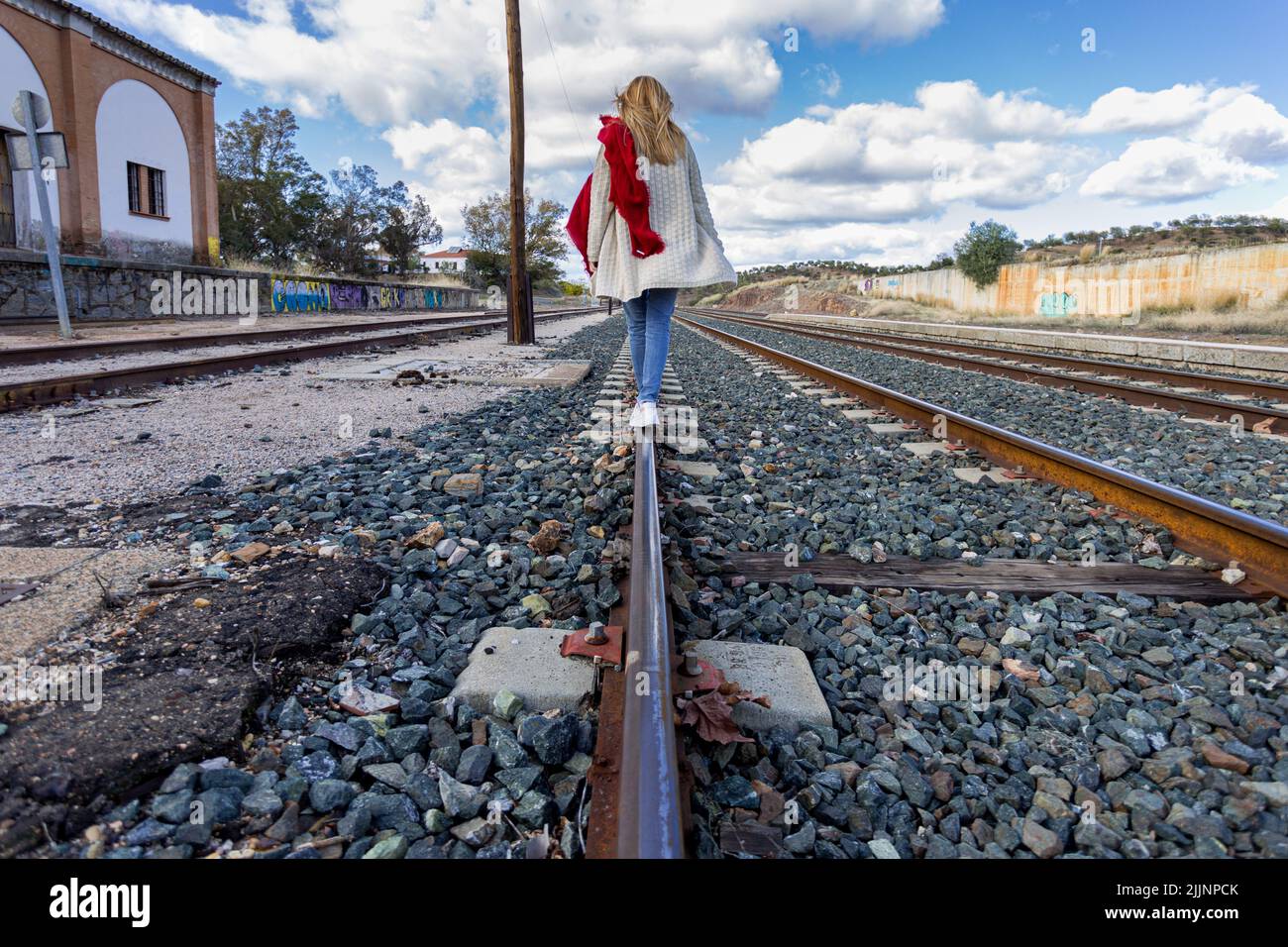 Woman walk on railroad hi-res stock photography and images - Alamy