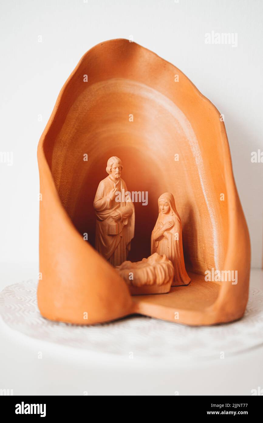vertical shot of wooden statue of birth of jesus Stock Photo - Alamy