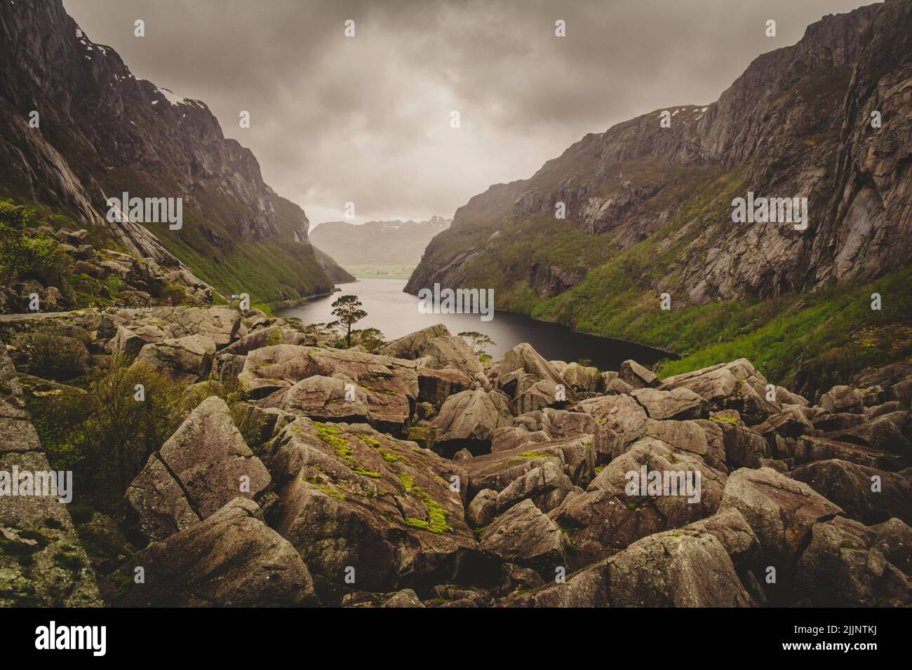 Beautiful fjord view in Norway with rock boulders and valley on a ...