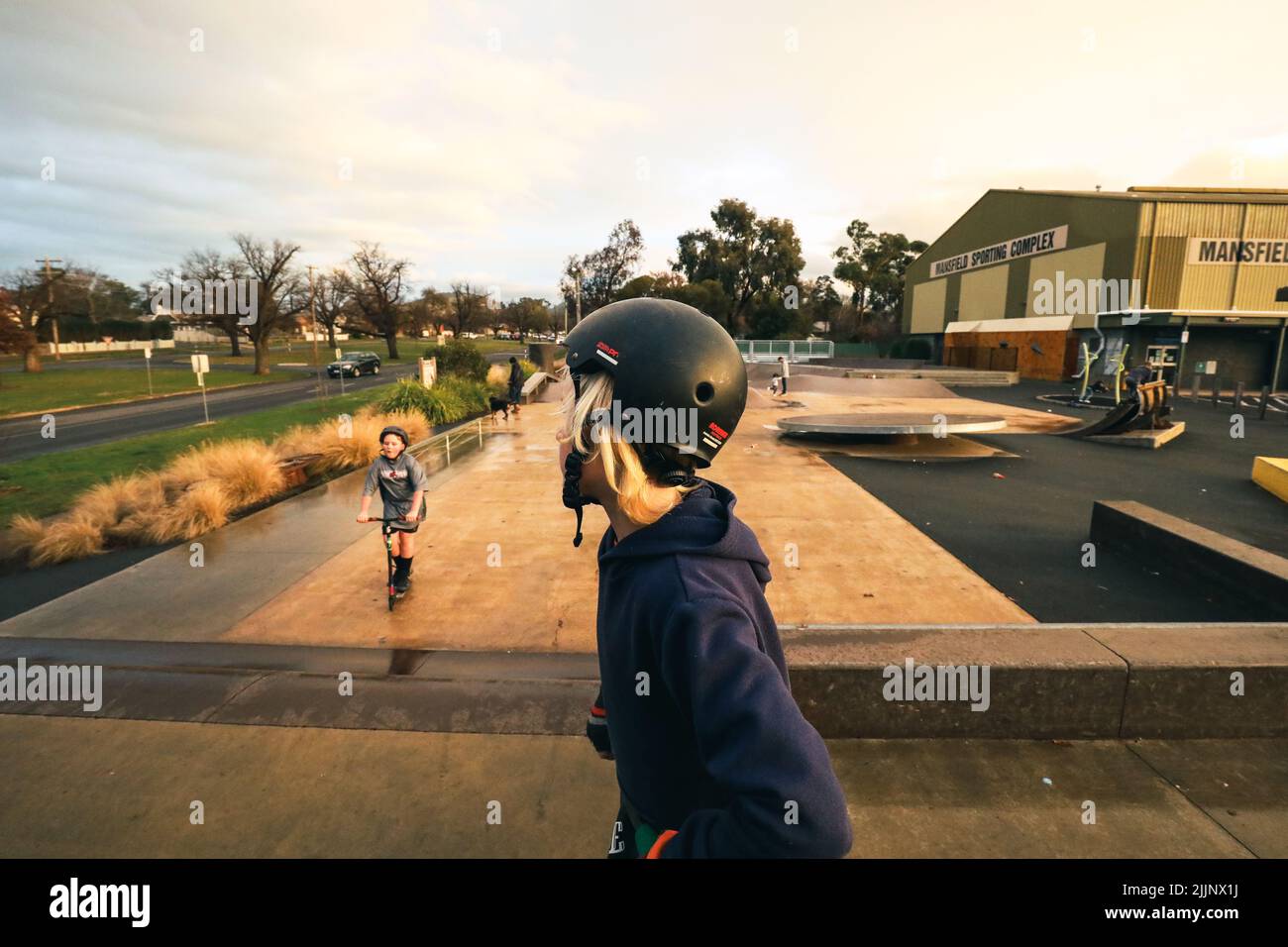 The Kids riding scooters at the local skate park. Mansfield, Australia ...