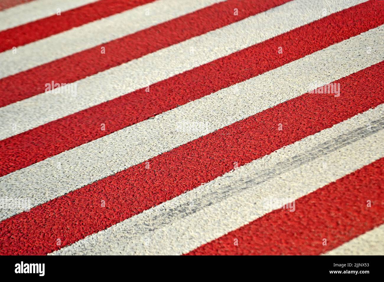 pedestrian crosswalk from red and white lines, modern travel security ...