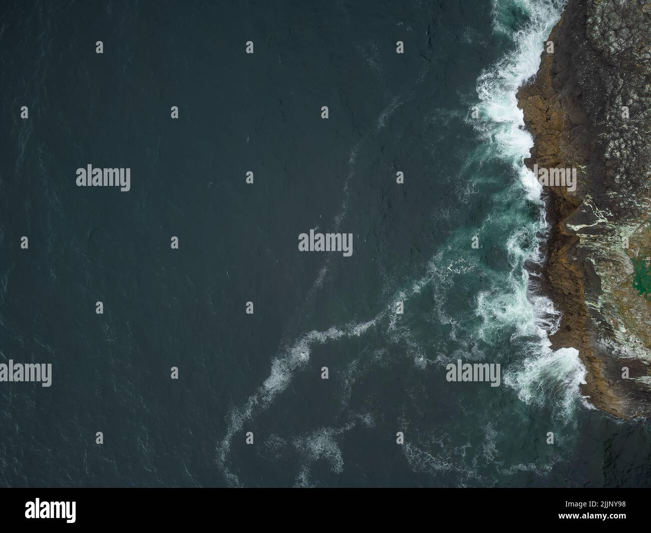 Shot from the air. Beautiful nature, seascape. Dark turquoise ocean ...
