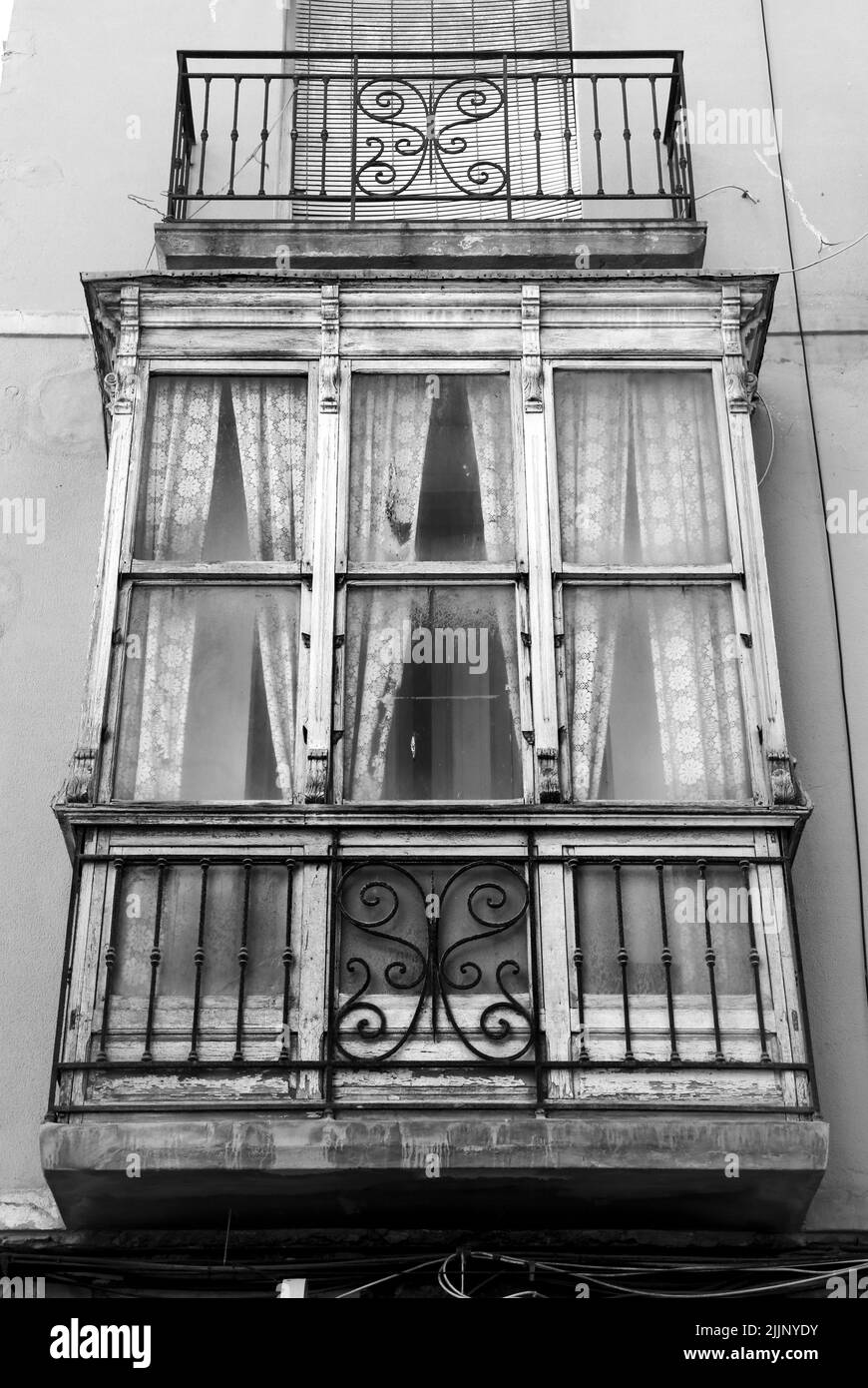 Old wooden balcony modernist style in Cartagena city, Murcia, Spain ...