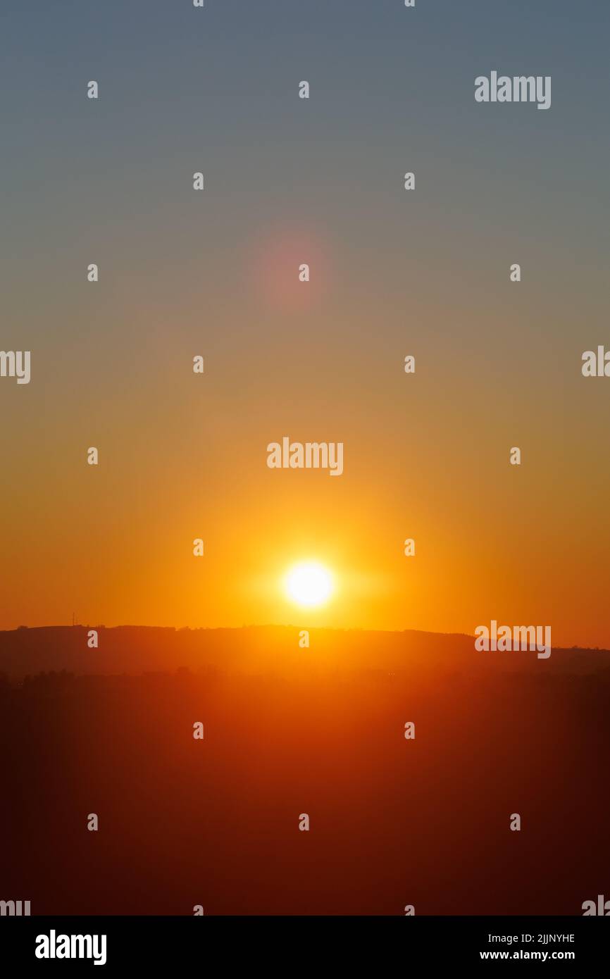 Bright yellow sunset hi-res stock photography and images - Alamy
