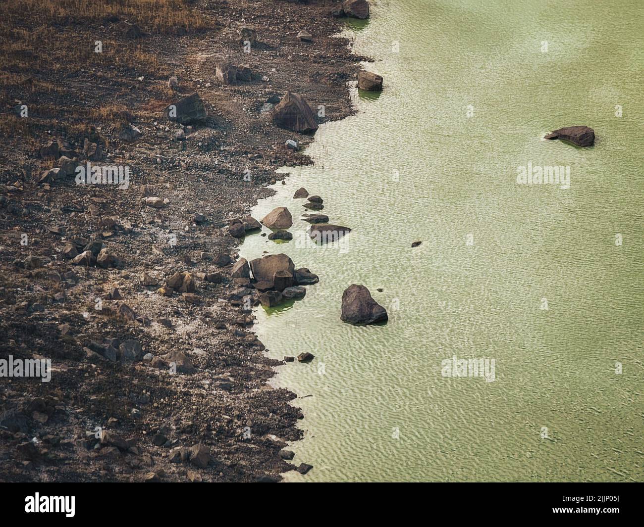 chot of lake meets beach ground creating beautifull scene Stock Photo ...