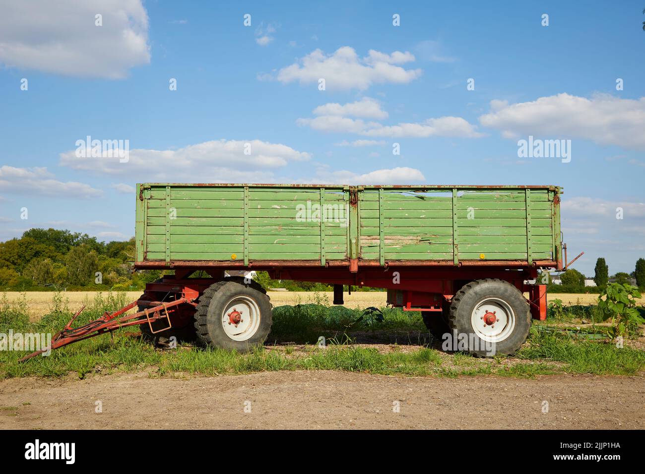 old agricultural trailer surrounded by farmland Stock Photo - Alamy