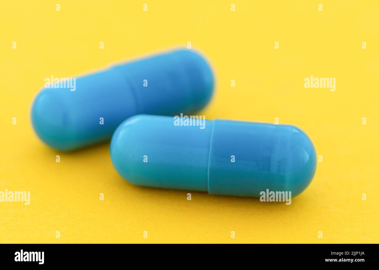 Blue capsule hi-res stock photography and images - Alamy