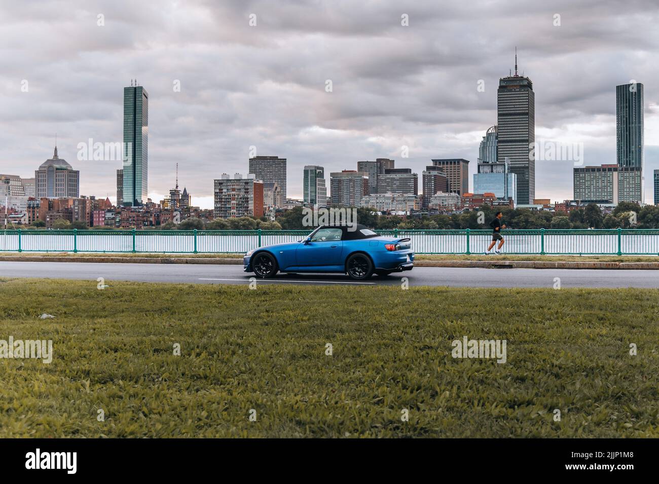 Blue car driving fast hi-res stock photography and images - Alamy
