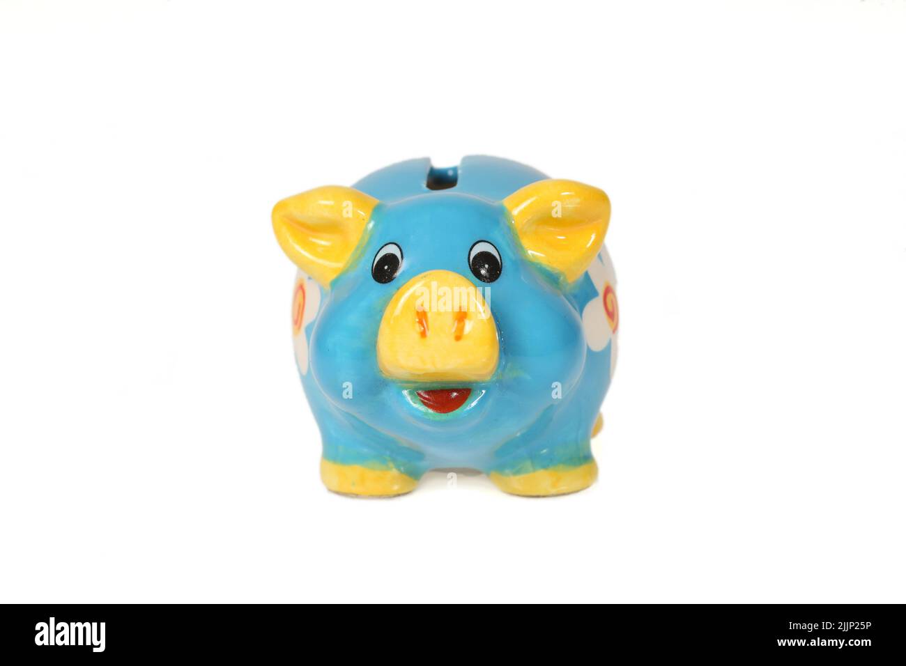A blue and yellow piggy bank isolated on a white background Stock Photo ...