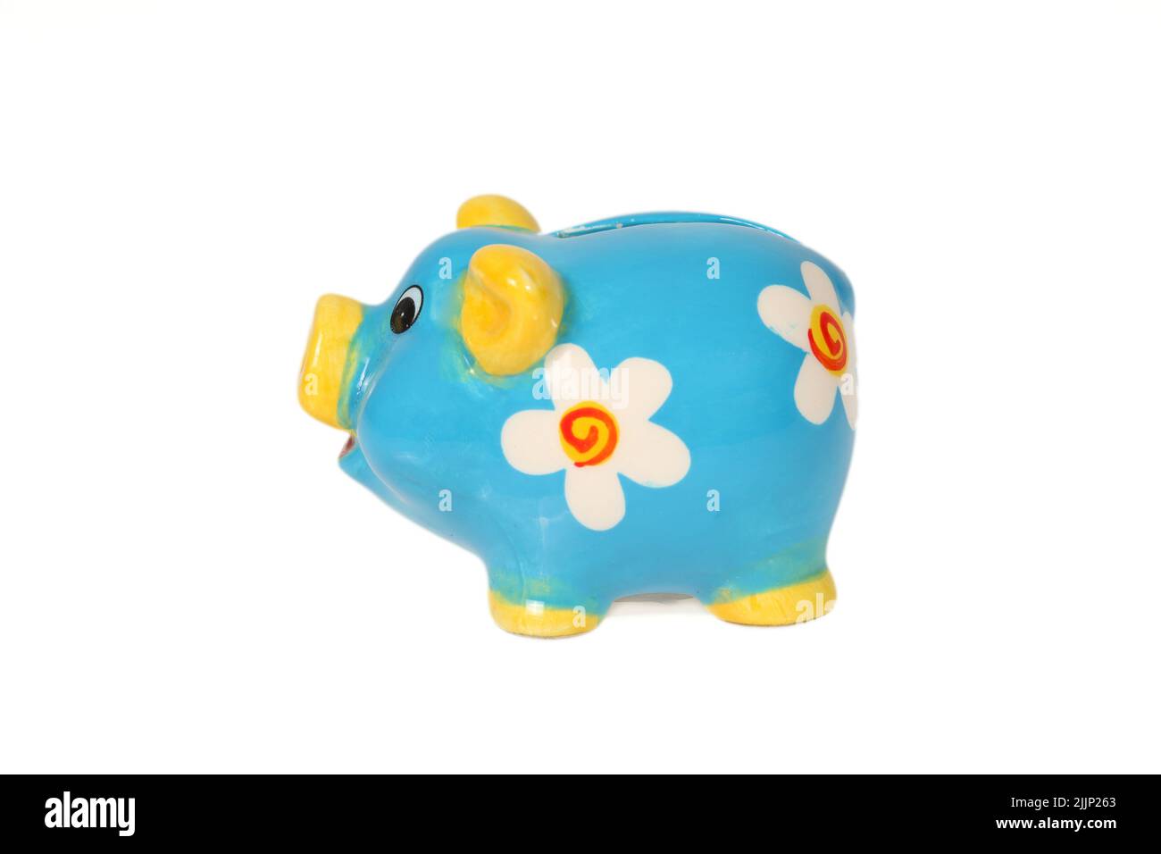 The blue piggy bank in profile is highlighted on a white background ...