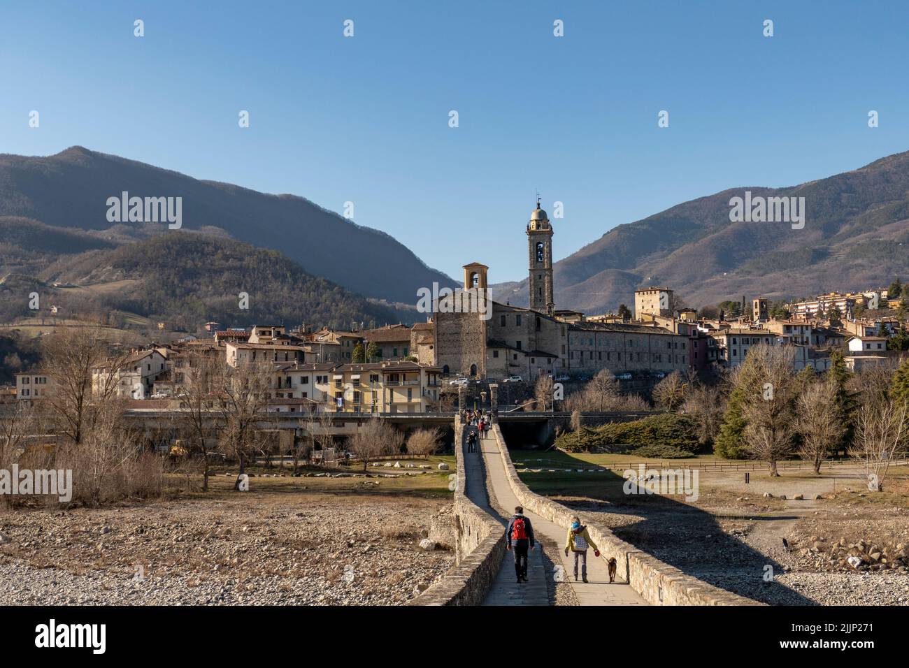 The Ponte Gobbo (Hunchback Bridge) in Bobbio, Italy with the old town ...