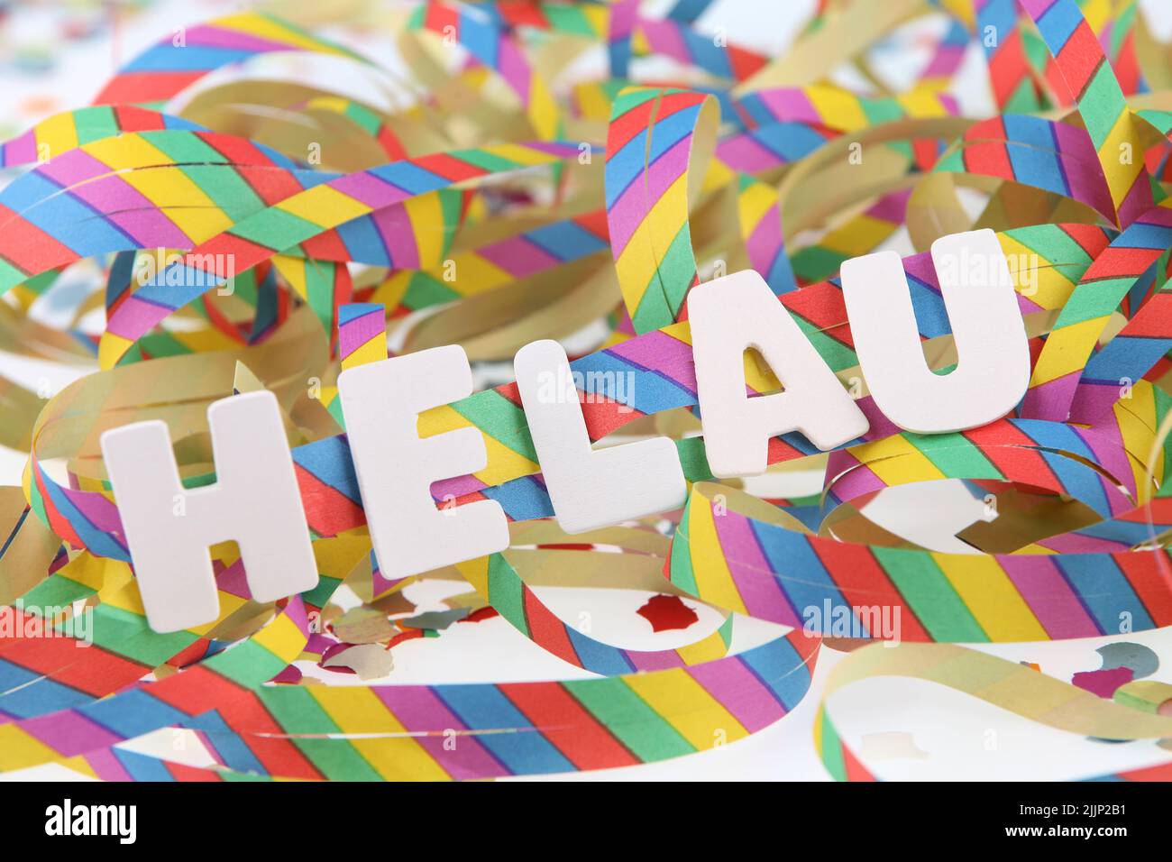 The word Helau on colorful streamers and confetti isolated on a white ...