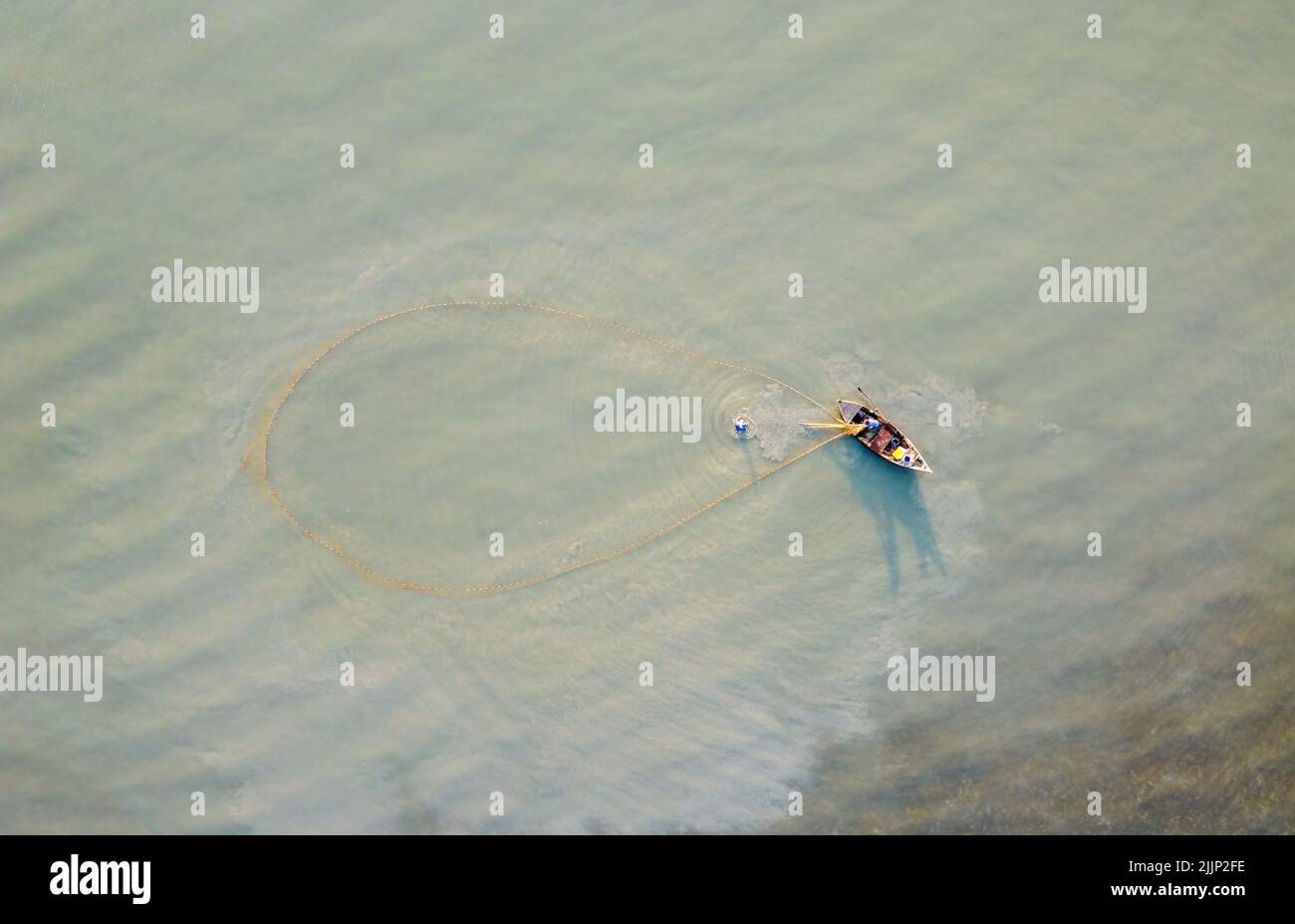 An aerial view fisherman cast net Stock Photo - Alamy