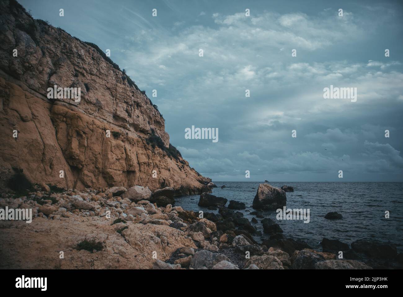 A beautiful view of a cliff at the sea, Cagliari, Sardinia Stock Photo ...