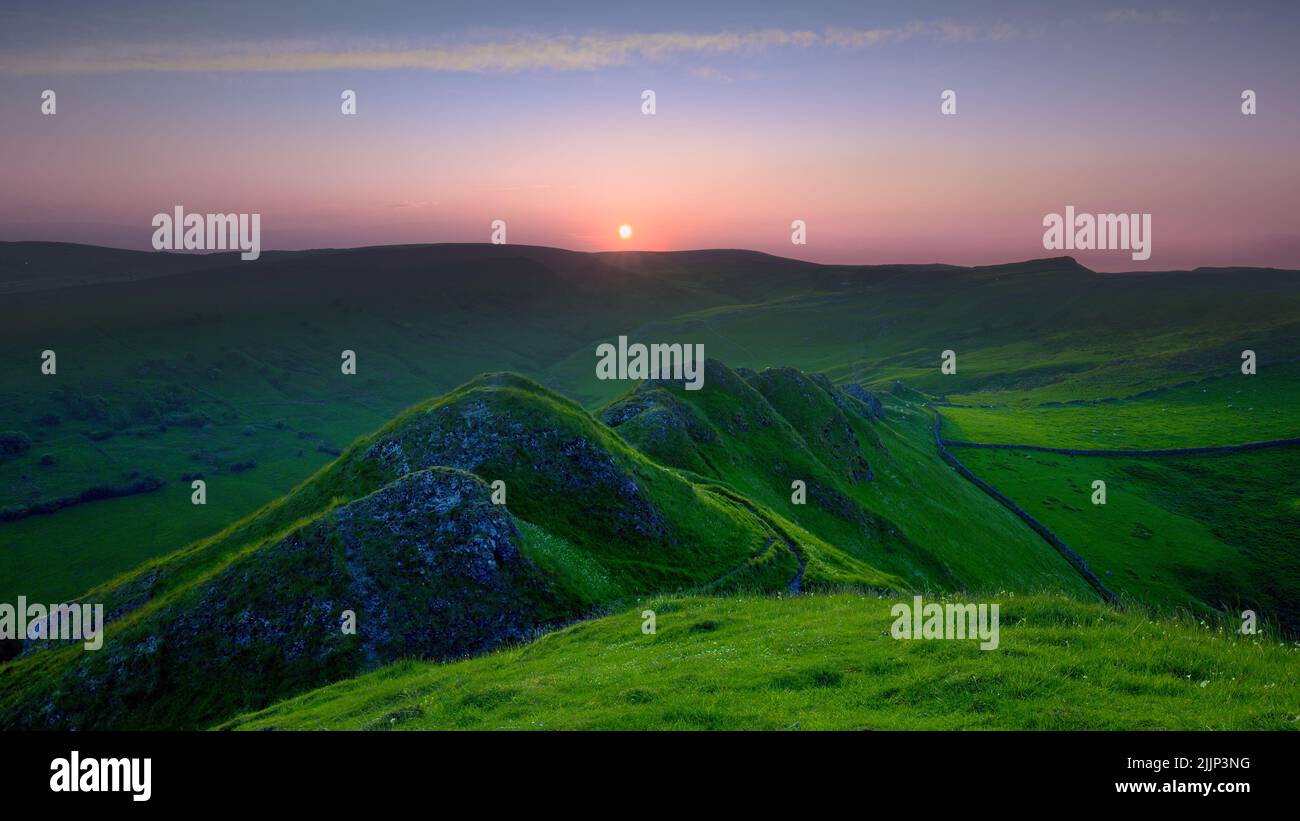 The setting sun from the top of Chrome Hill, Peak District Stock Photo ...