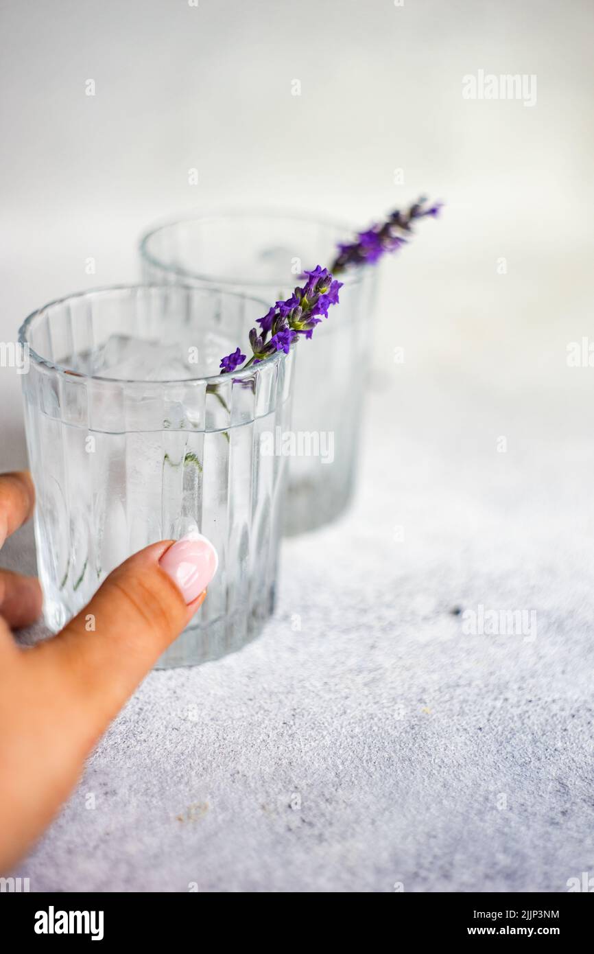 Womans hand holding cocktail glass hi-res stock photography and images ...