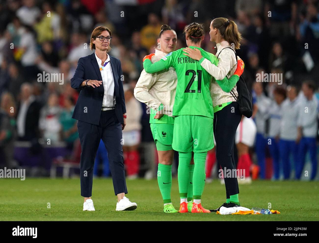 France head coach Corinne Diacre goes to console goalkeeper Pauline ...