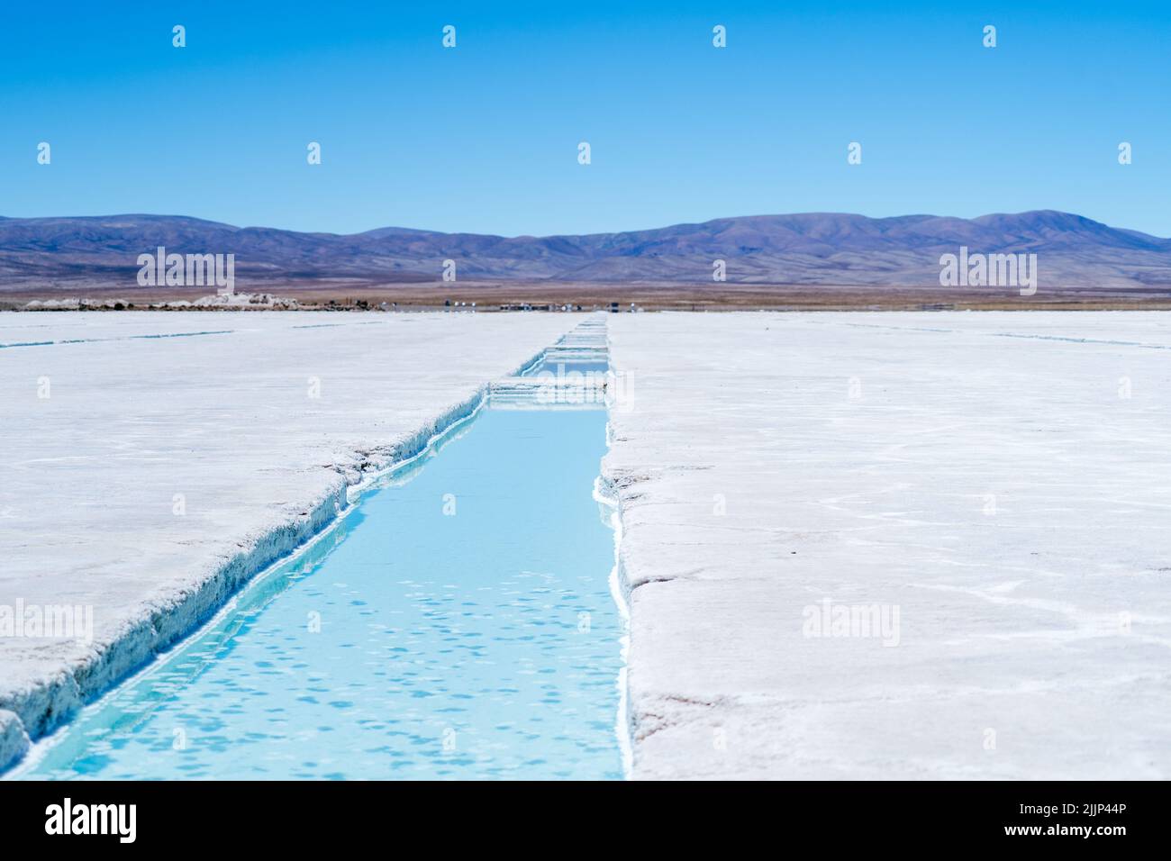 A beautiful shot of salt water pool on the Salinas Grandes, Argentina ...