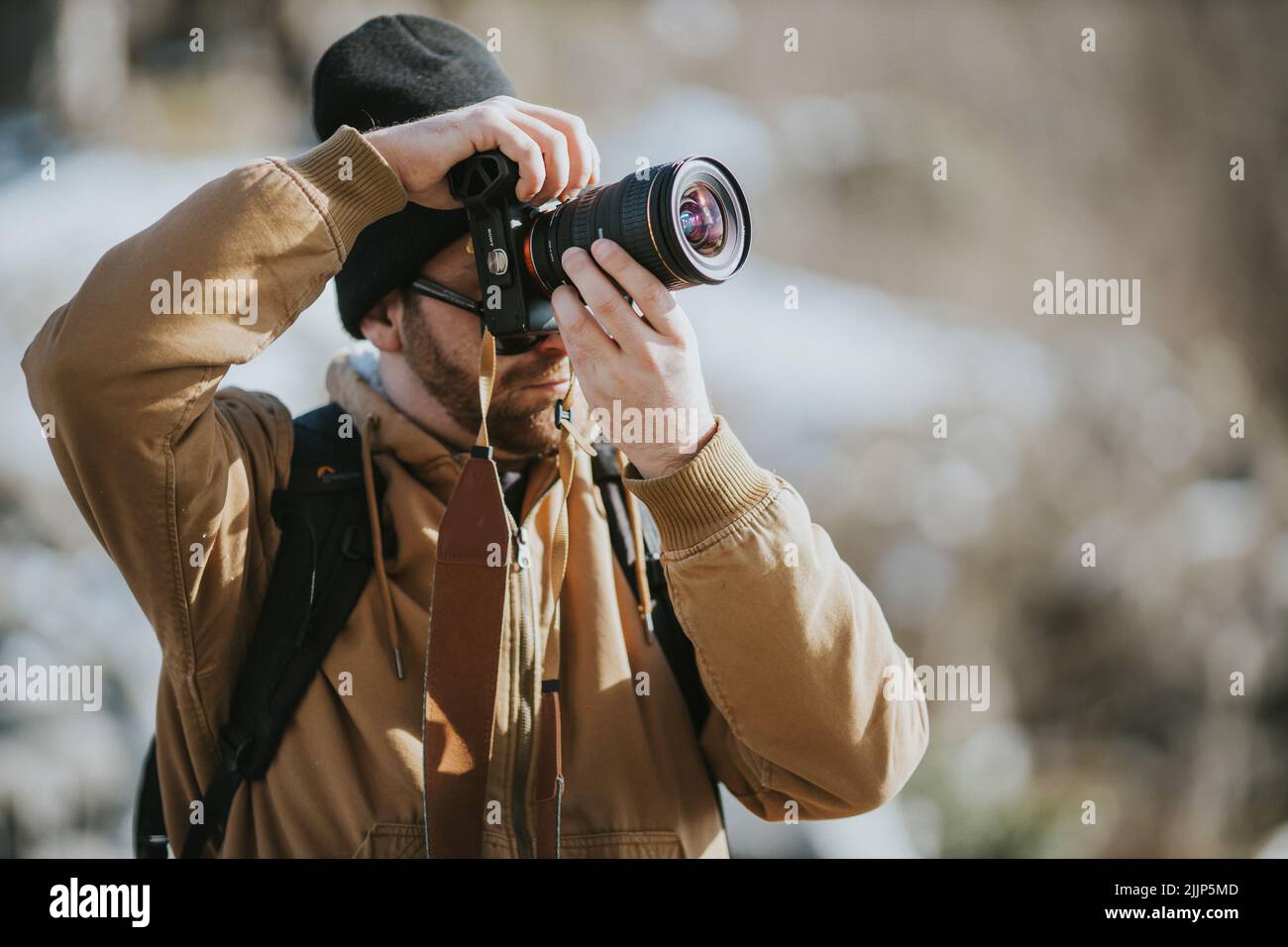 Young man looking camera using hi-res stock photography and images - Alamy