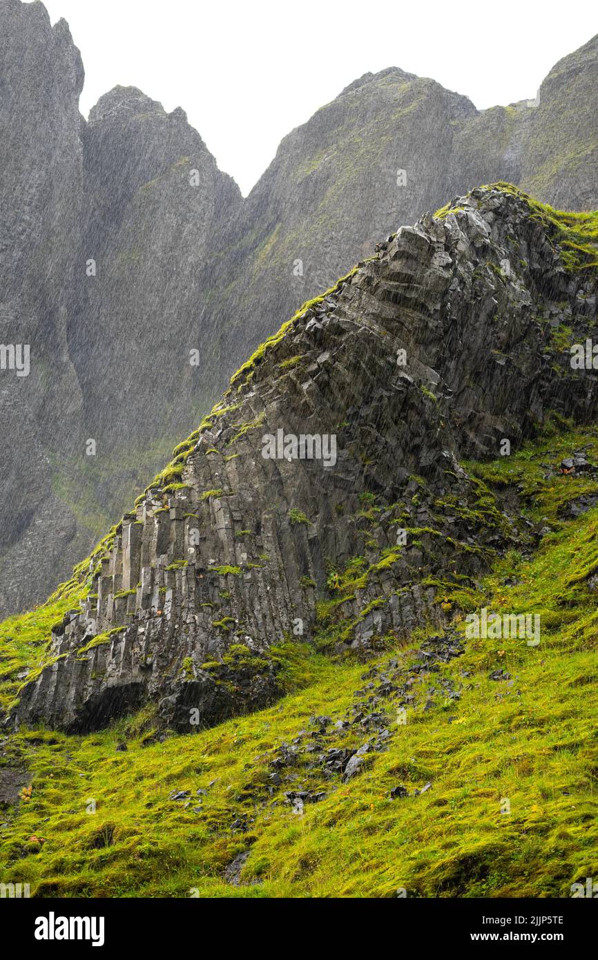 A wallpaper of green rock and stones Stock Photo - Alamy