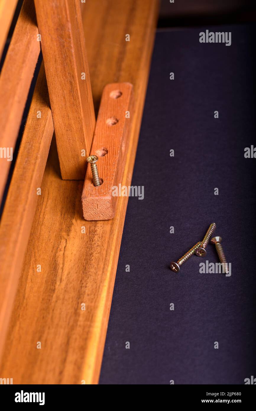 Assembling The Furniture With Screwdriver Cordless Screwdriver Or