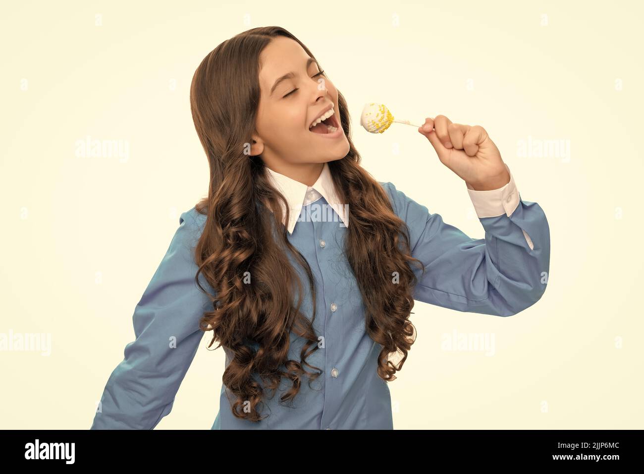 yummy. glad girl isolated on white. happy child with chocolate. kid ...