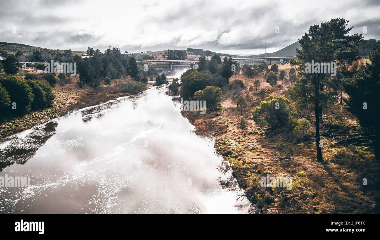 The water flowing from the open dam in the countryside Stock Photo - Alamy