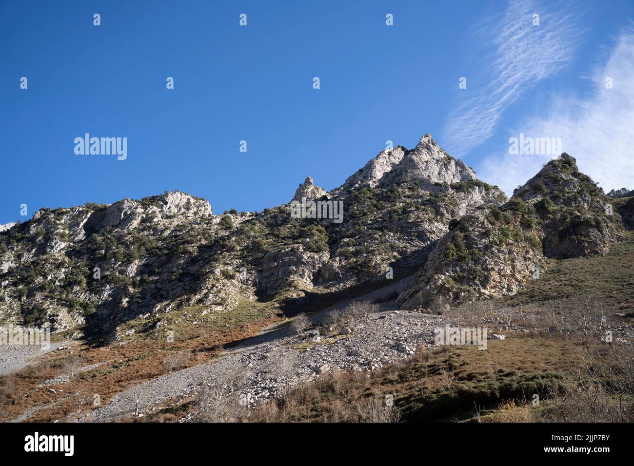 A low-angle shot of the mountains from Picos de Europa National Park in ...
