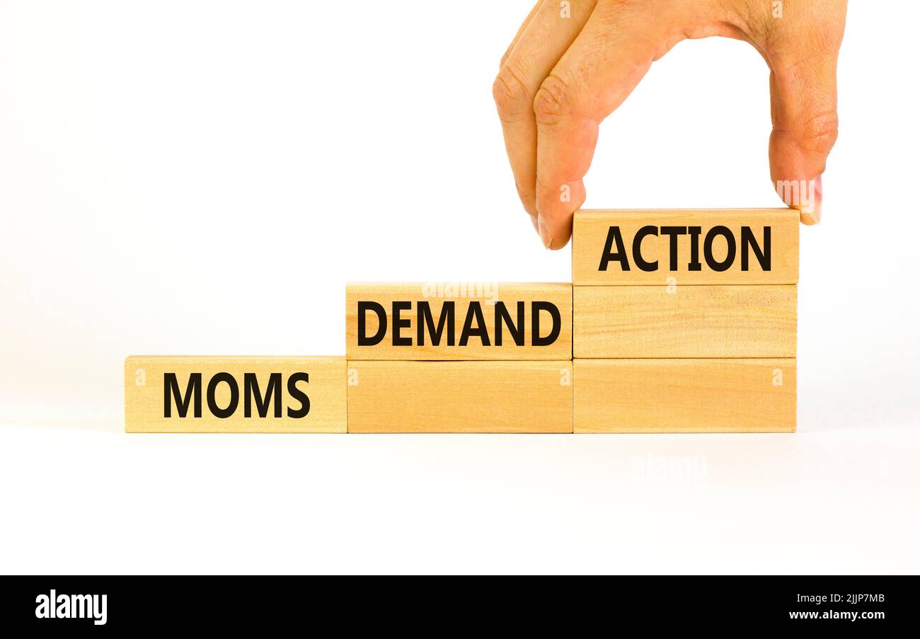 Moms demand action symbol. Concept words Moms demand action on wooden ...