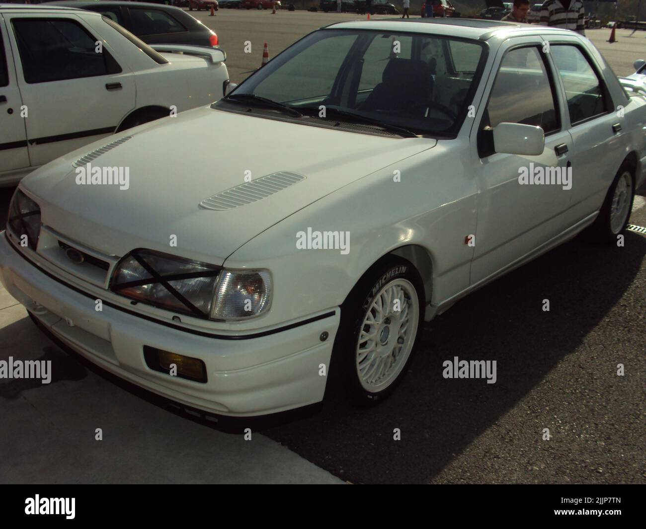 A view of parked Ford Sierra classic street car on a sunny day Stock ...