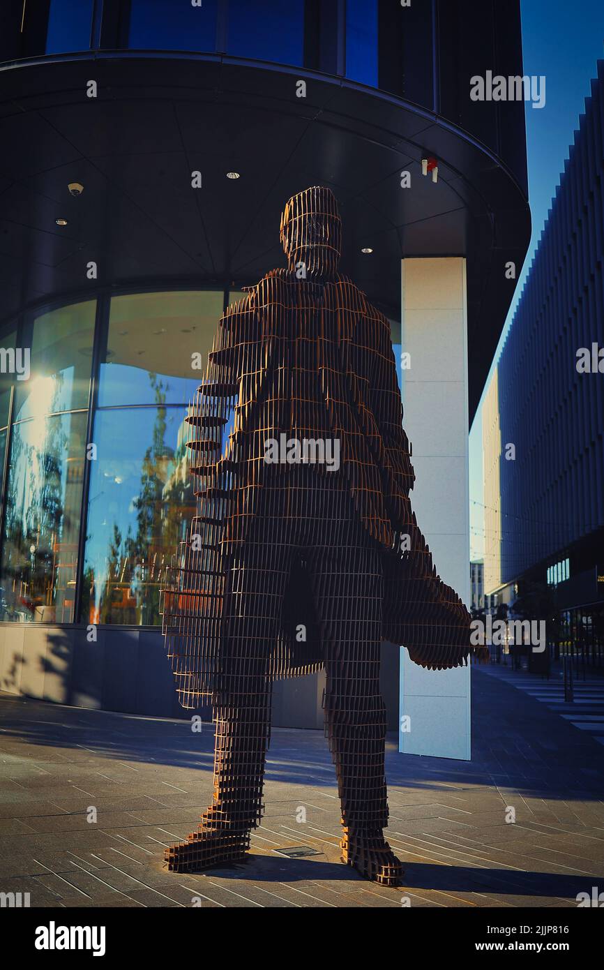 A modern metal statue of a man in the capital city of Australia Stock ...