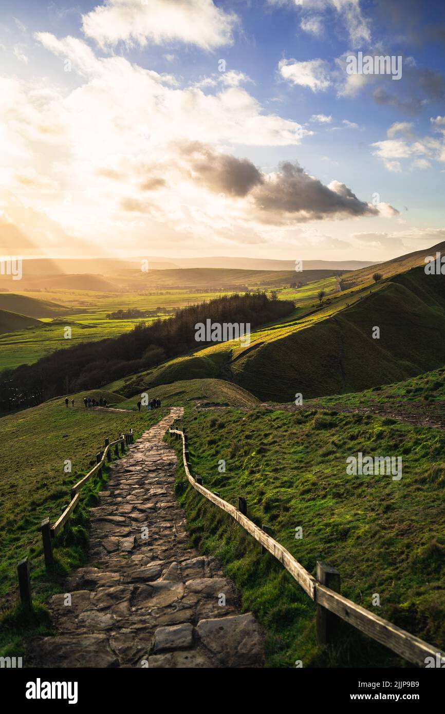 Golden hour and sunrise over Mam Tor in the Peak District National Park ...