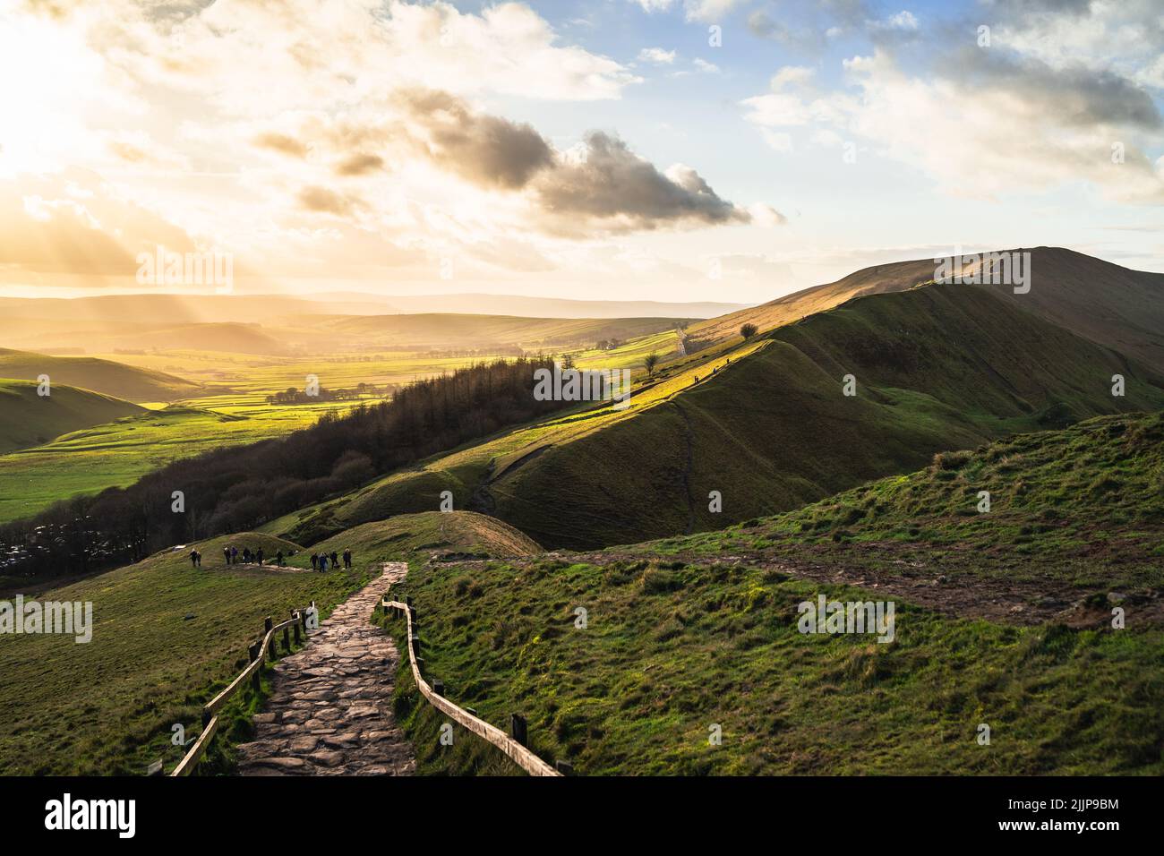 Golden hour and sunrise over Mam Tor in the Peak District National Park ...