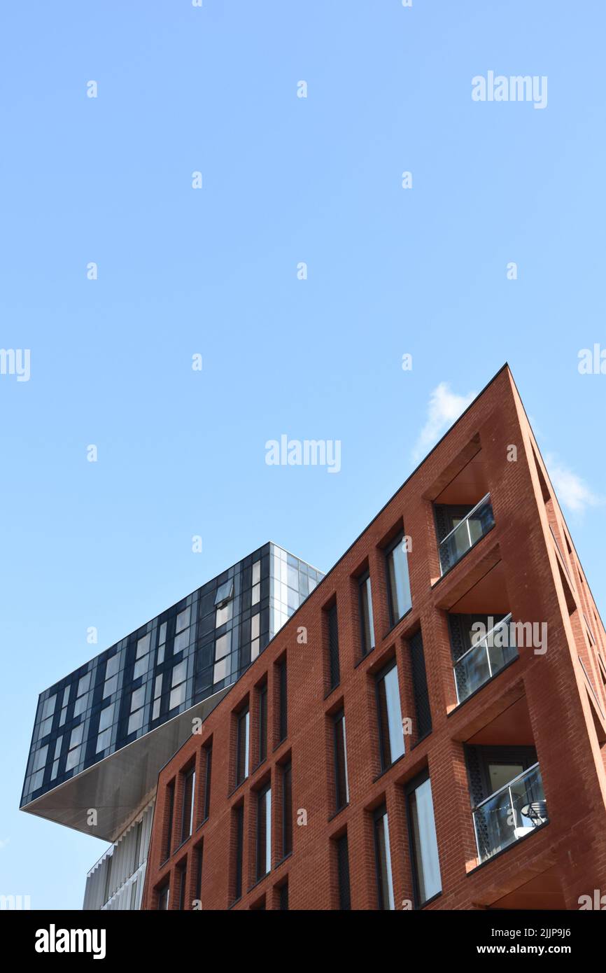 A low angle shot of the Burlington House, an Apartment complex in ...