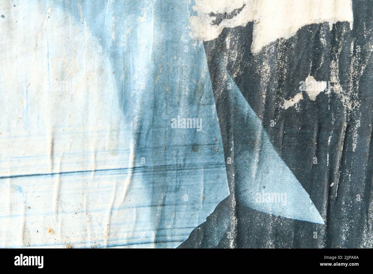 Torn poster on wall hi-res stock photography and images - Alamy