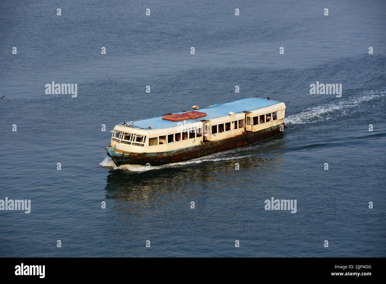 Picture shows a small ferry boat transporting people in Cochin India ...