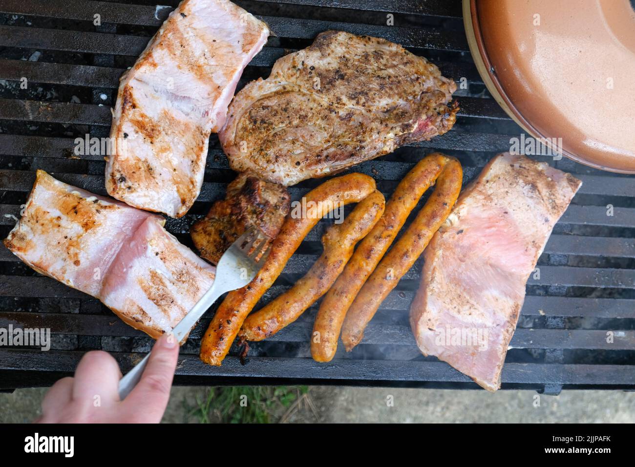 Hand the meat hi-res stock photography and images - Alamy