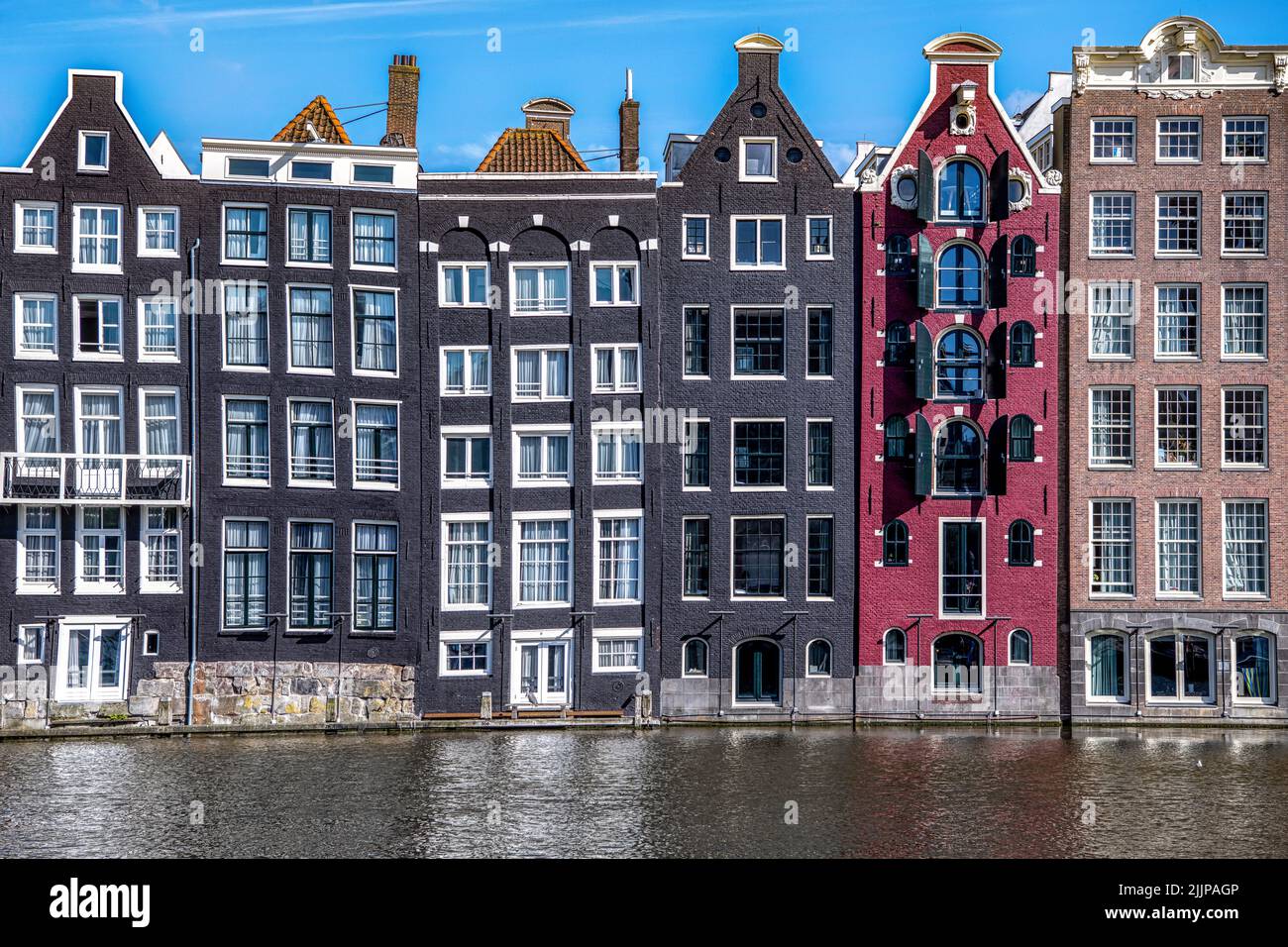 Waterfront houses along a canal, Amsterdam, Holland Stock Photo - Alamy